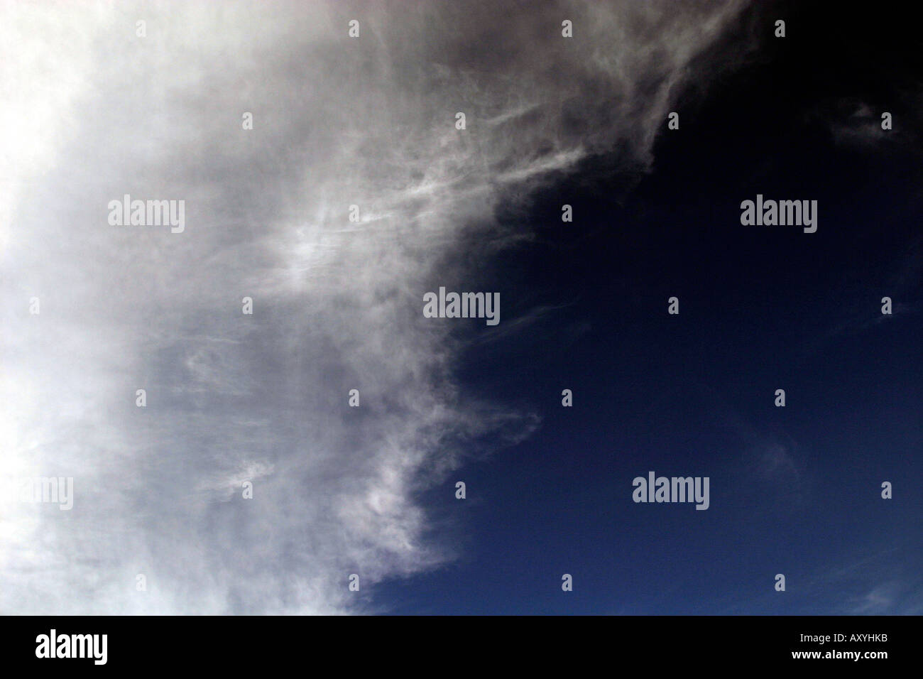 Blue sky with fast moving clouds Stock Photo - Alamy