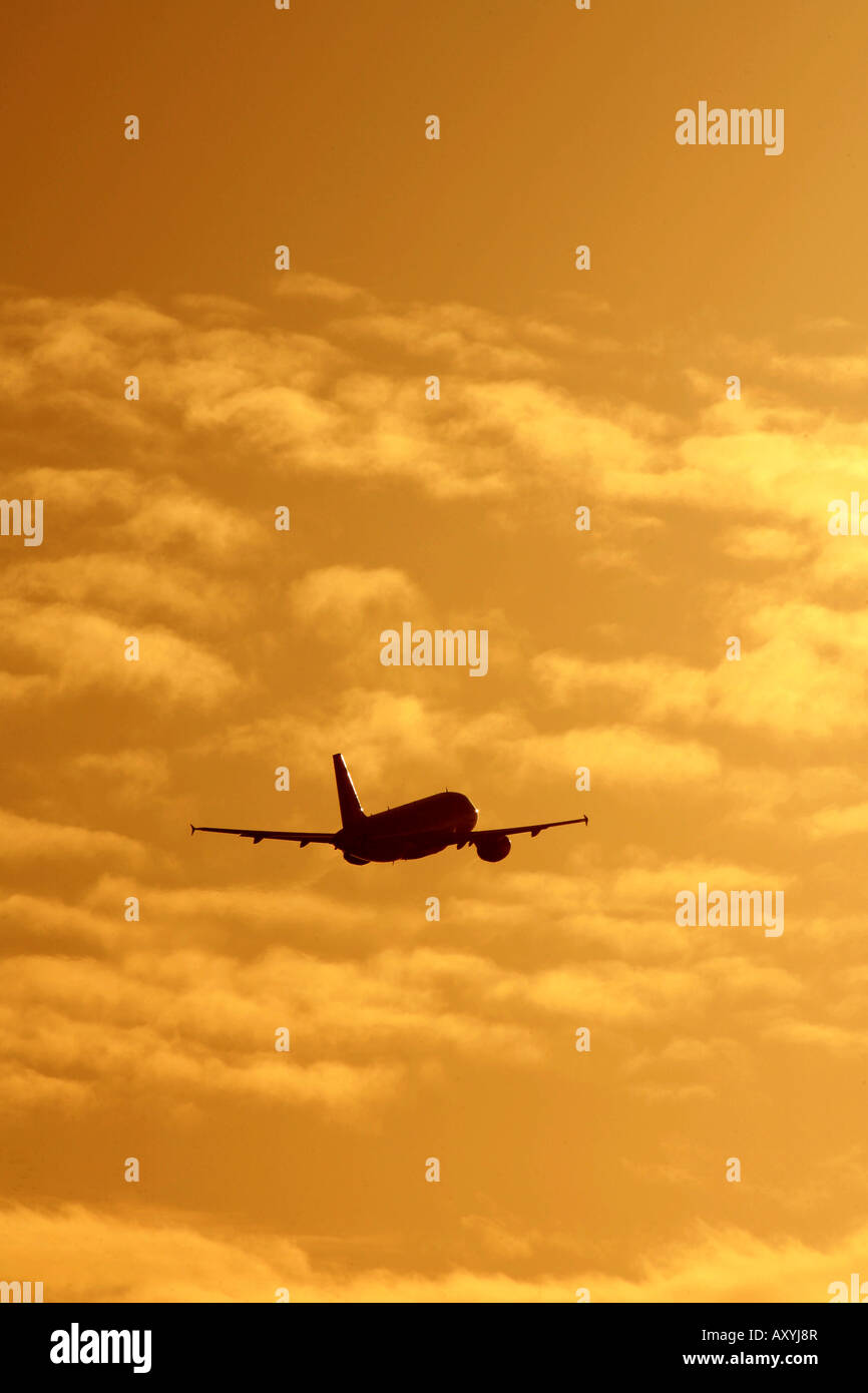Easyjet Airbus A319 taking off from Stansted at sunset Stock Photo - Alamy