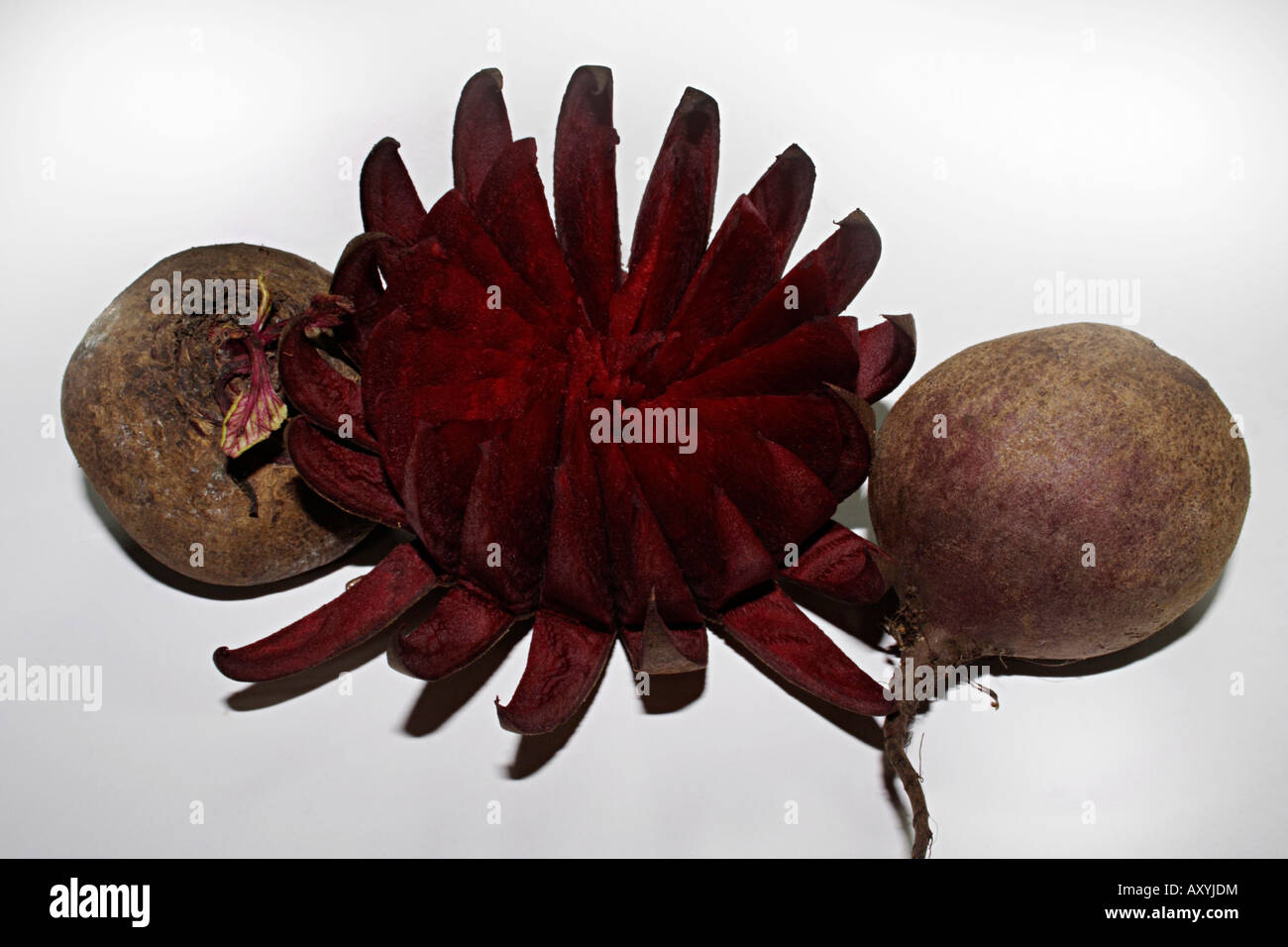 Beet-root cutting decorative for salad Stock Photo - Alamy