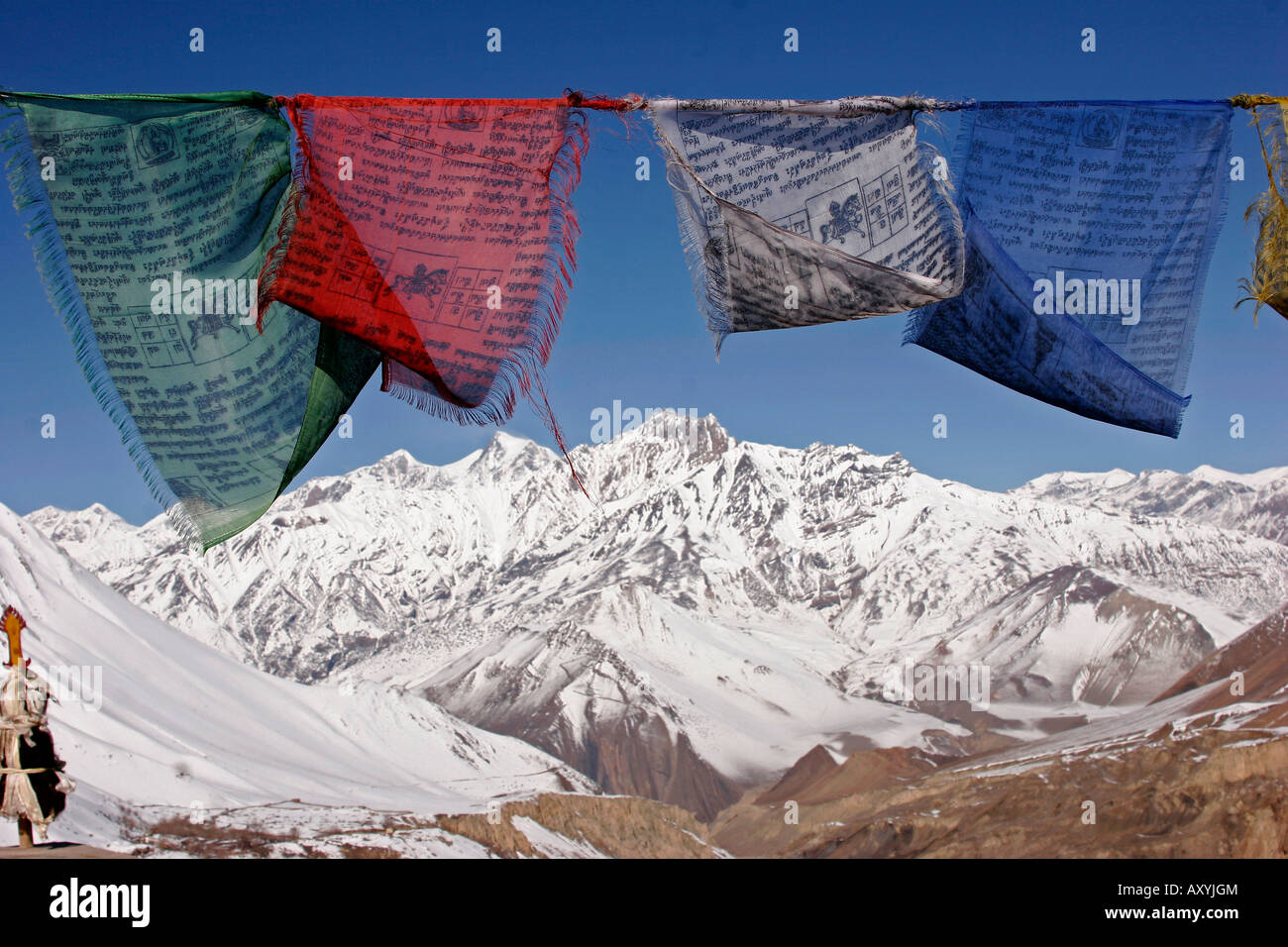 prayer flags and the himalaya in Nepal asia Stock Photo - Alamy