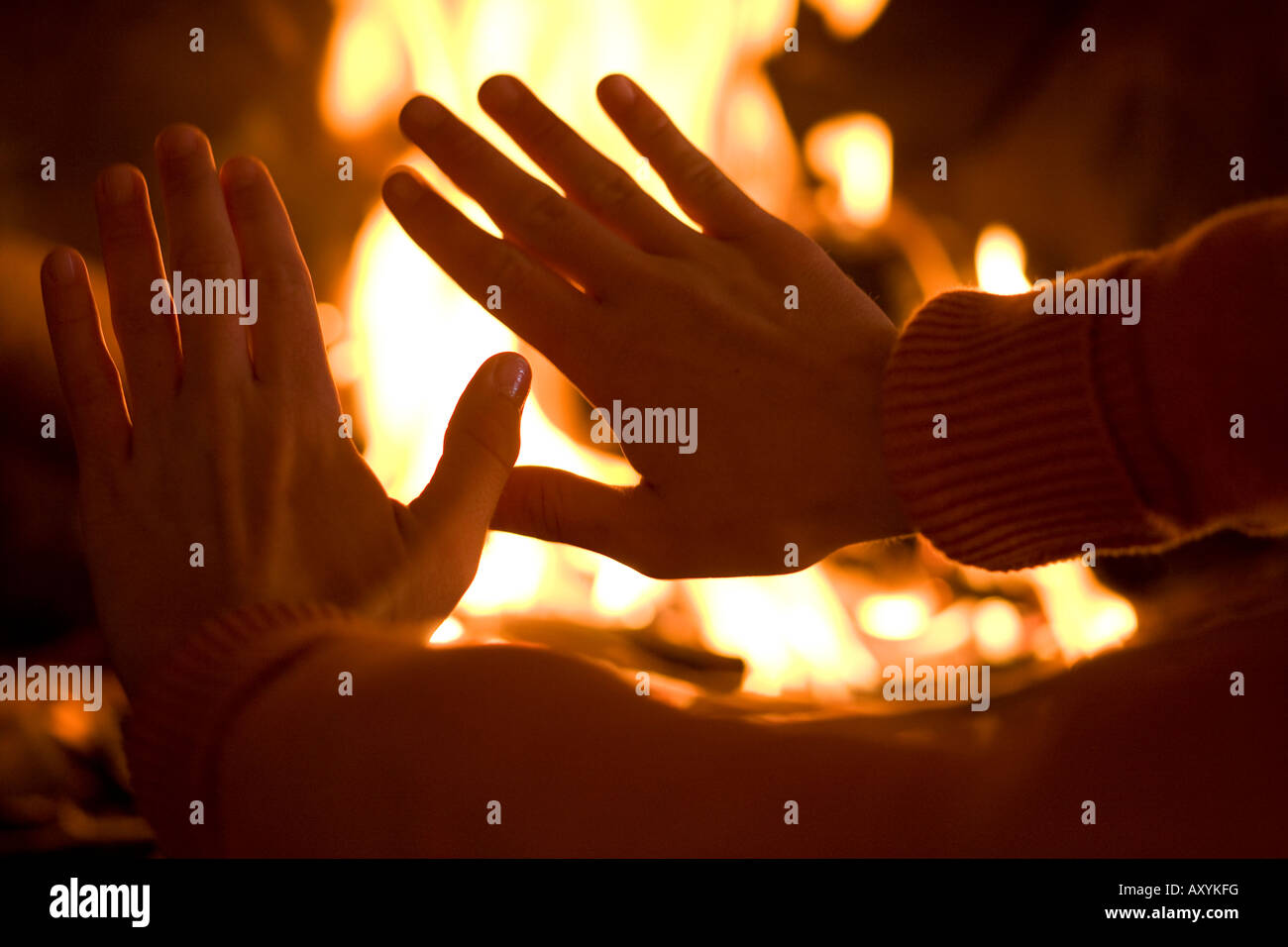 Warming Hands By Fire High Resolution Stock Photography and Images - Alamy