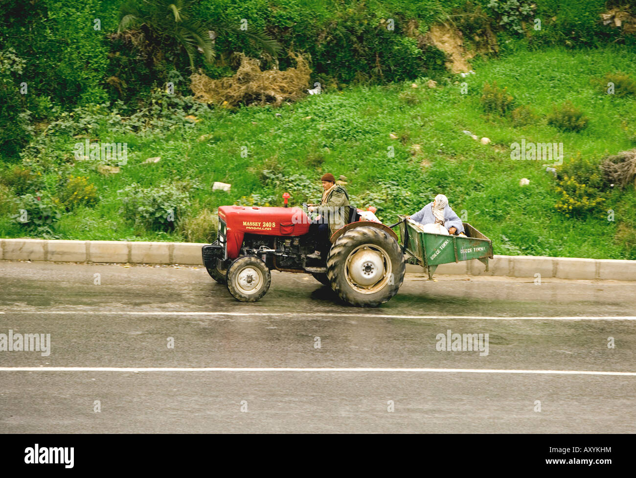 Family road trip, journey in tractor and trailer. Elderly lady ...