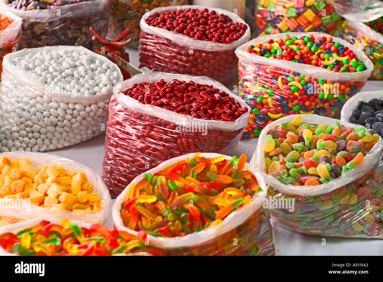 Colorful composition of bulk candy in bags in open air market Stock ...