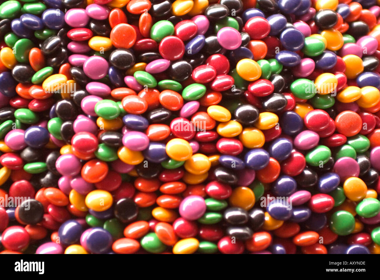 Colorful candy in bulk in a bin for sale Stock Photo - Alamy