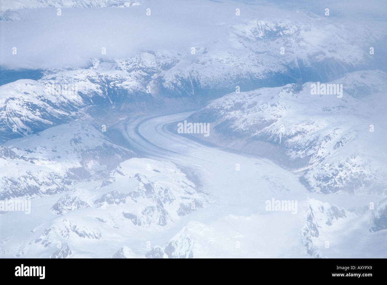 aerial photo of a glacier in the snow covered mountains of South Chile ...