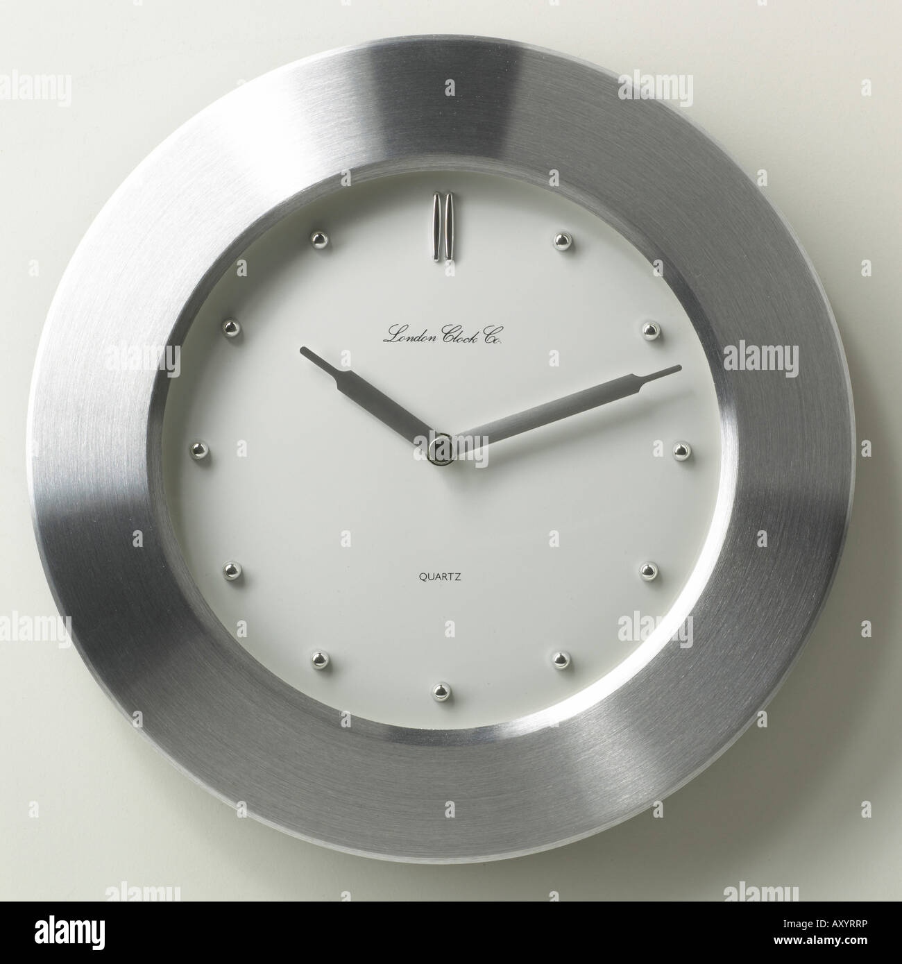 Clock on white background Stock Photo - Alamy