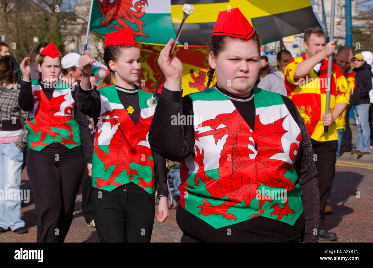 Girls with Welsh red dragon waistcoats on annual St Davids Day march in ...