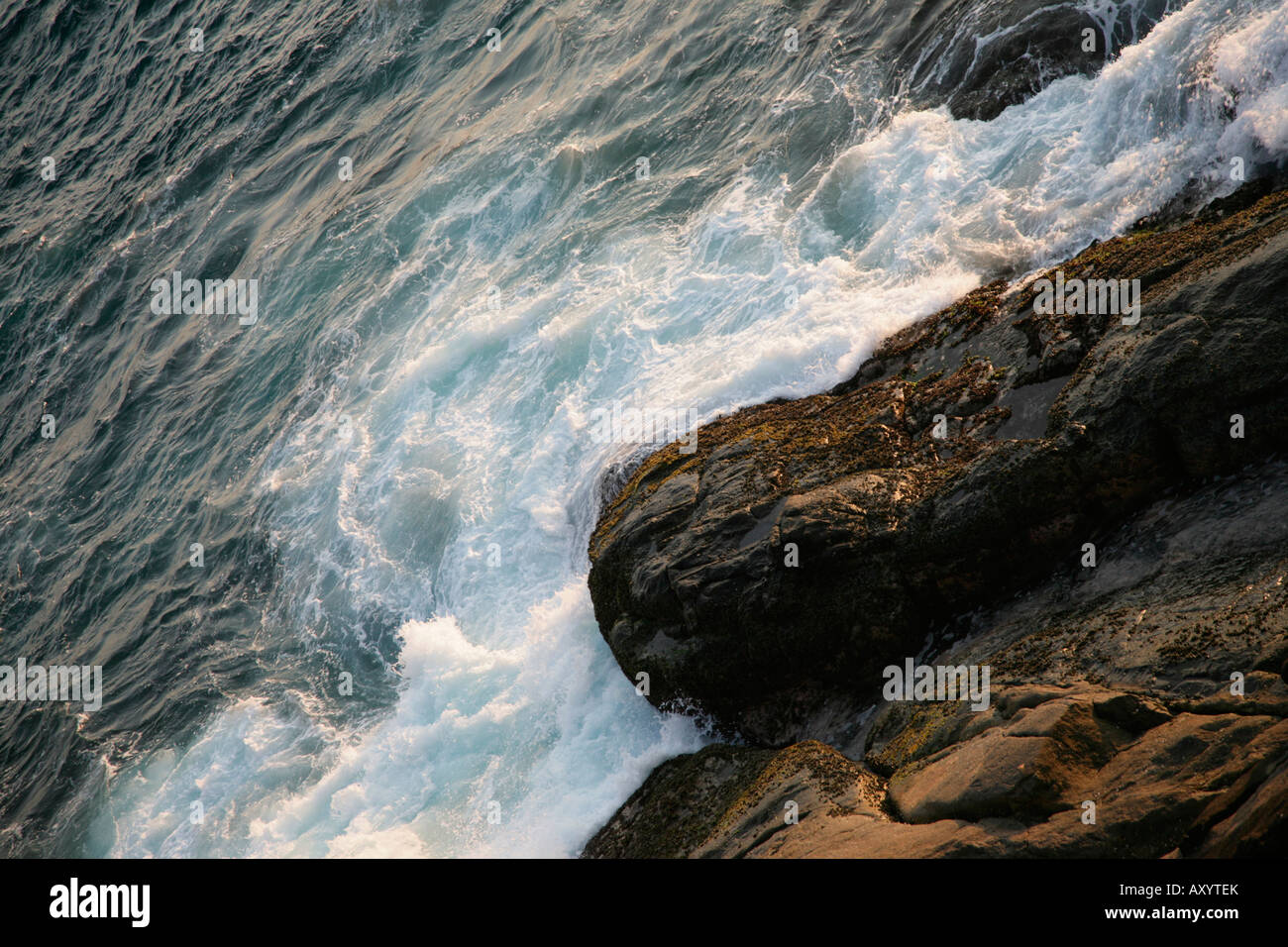 waves hitting rocks at kovalam,india Stock Photo - Alamy