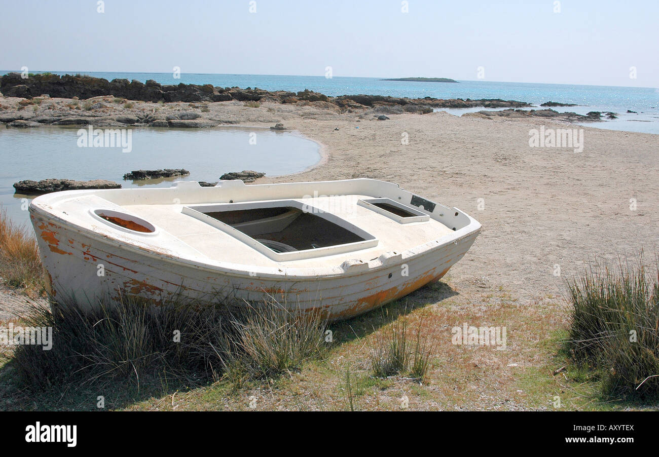 Boat drydocked at beach Stock Photo - Alamy
