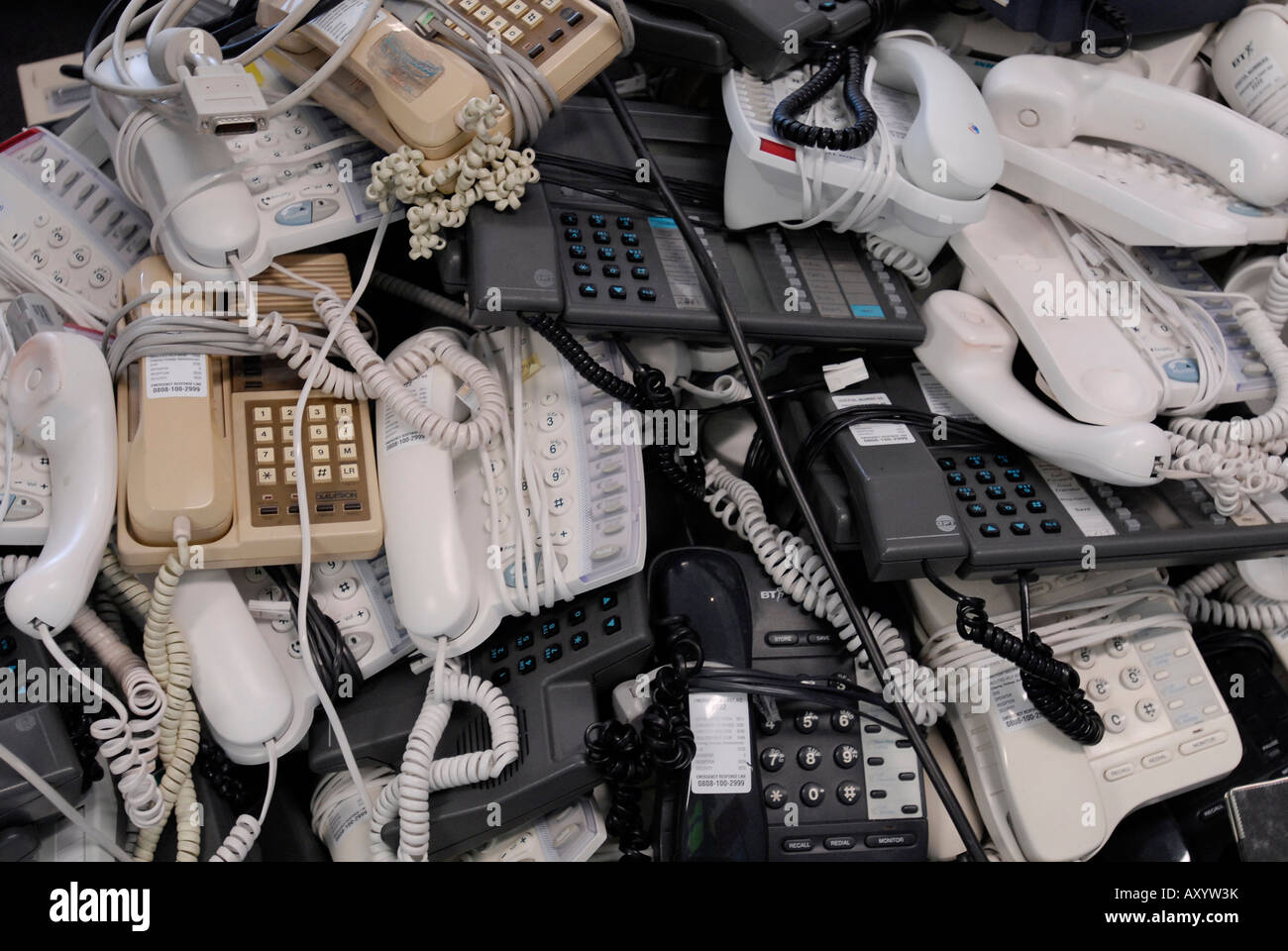 Office telephones awaiting recycling Stock Photo - Alamy