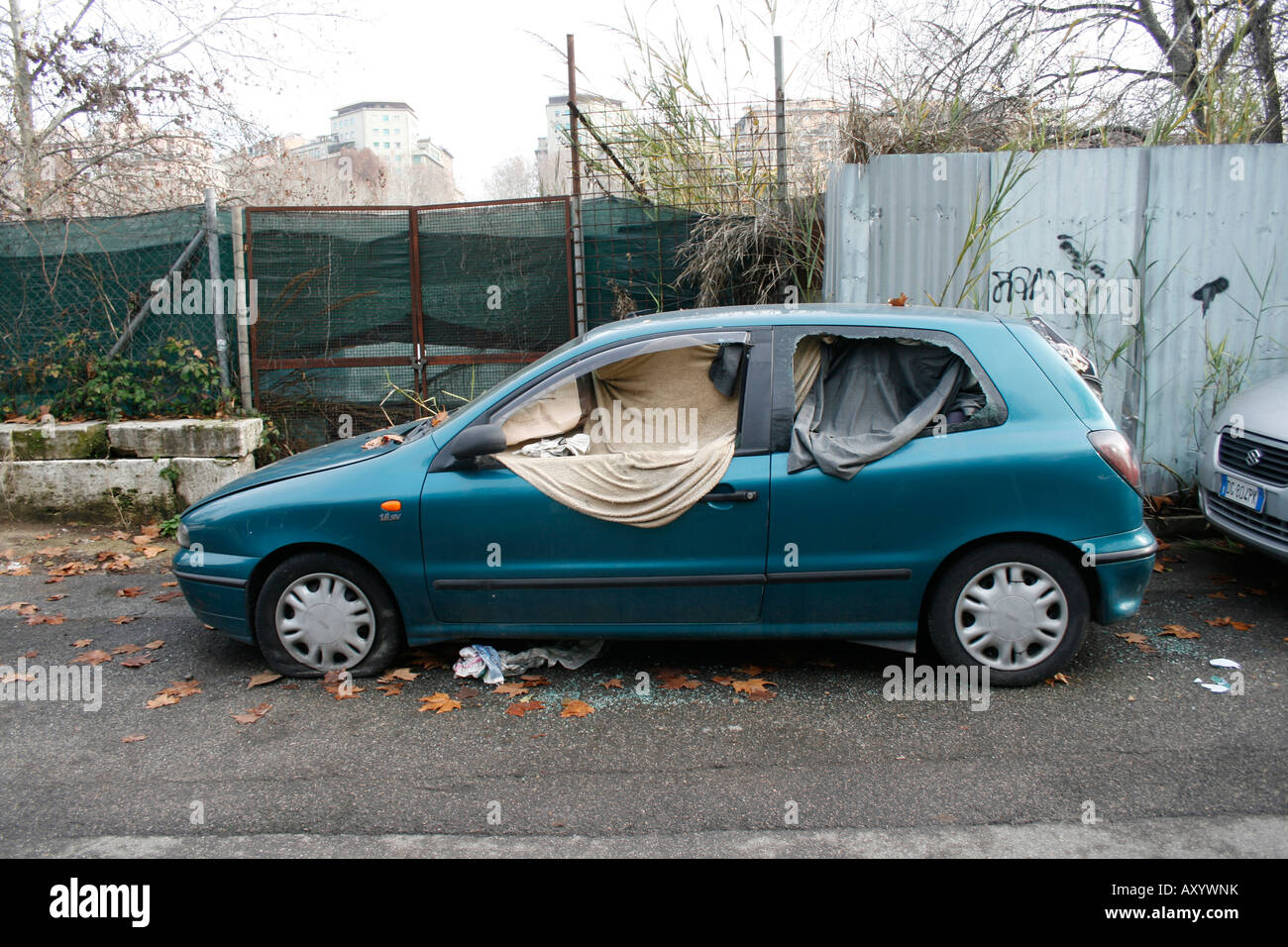 vandalised car used as a shelter by the homeless Stock Photo - Alamy