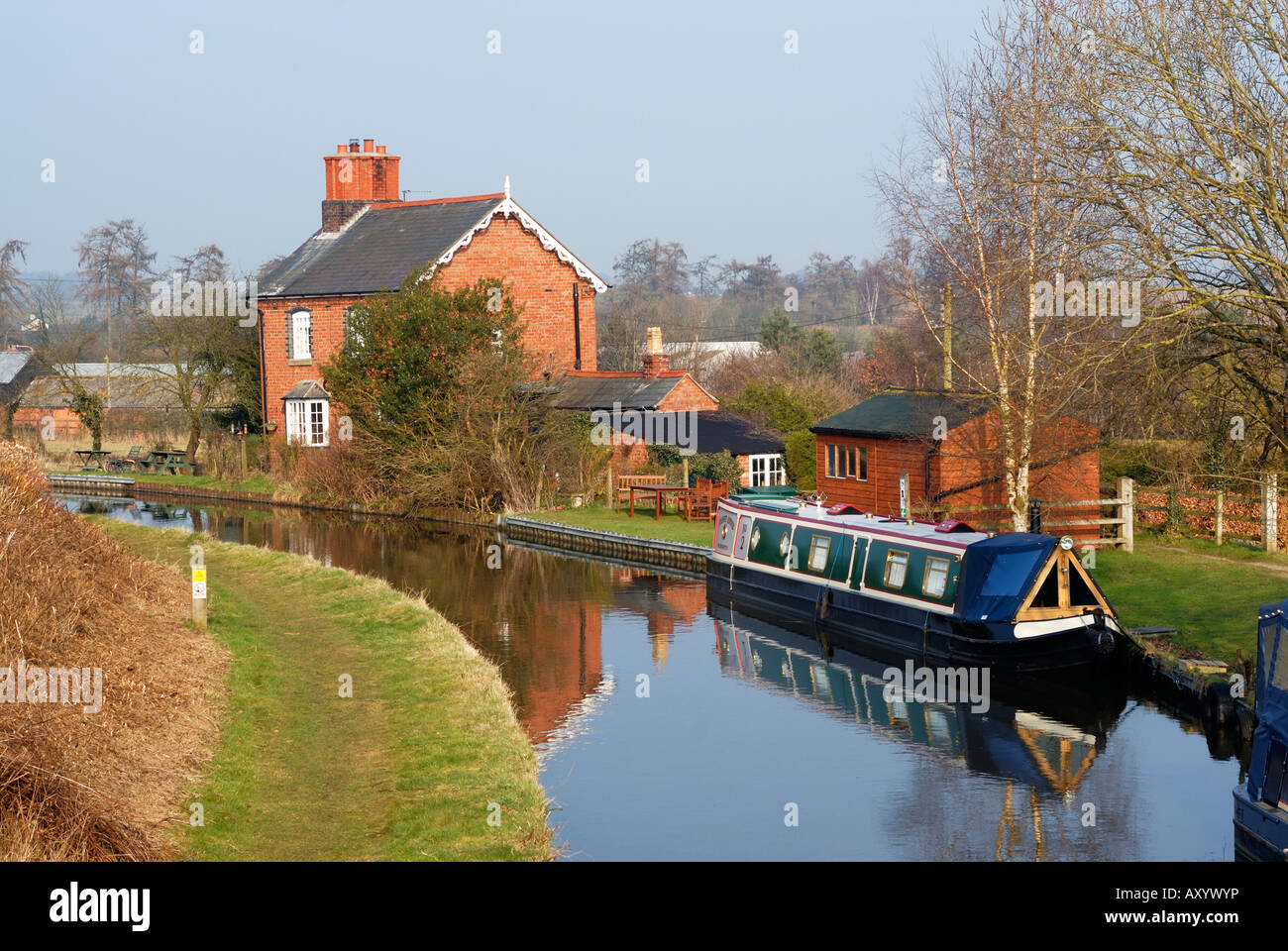 Llangollen Canal, narrowboat and canalside house near Bettisfield, Wem ...