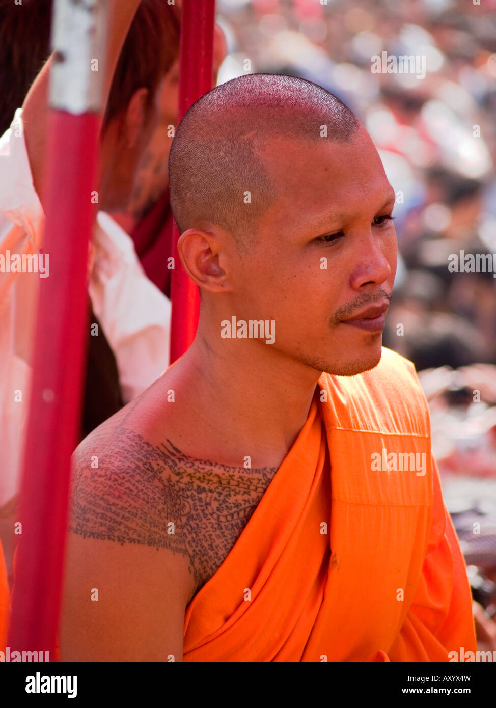 monk with tattoos at the Wat Bang Phra Tattoo Festival in Thailand ...