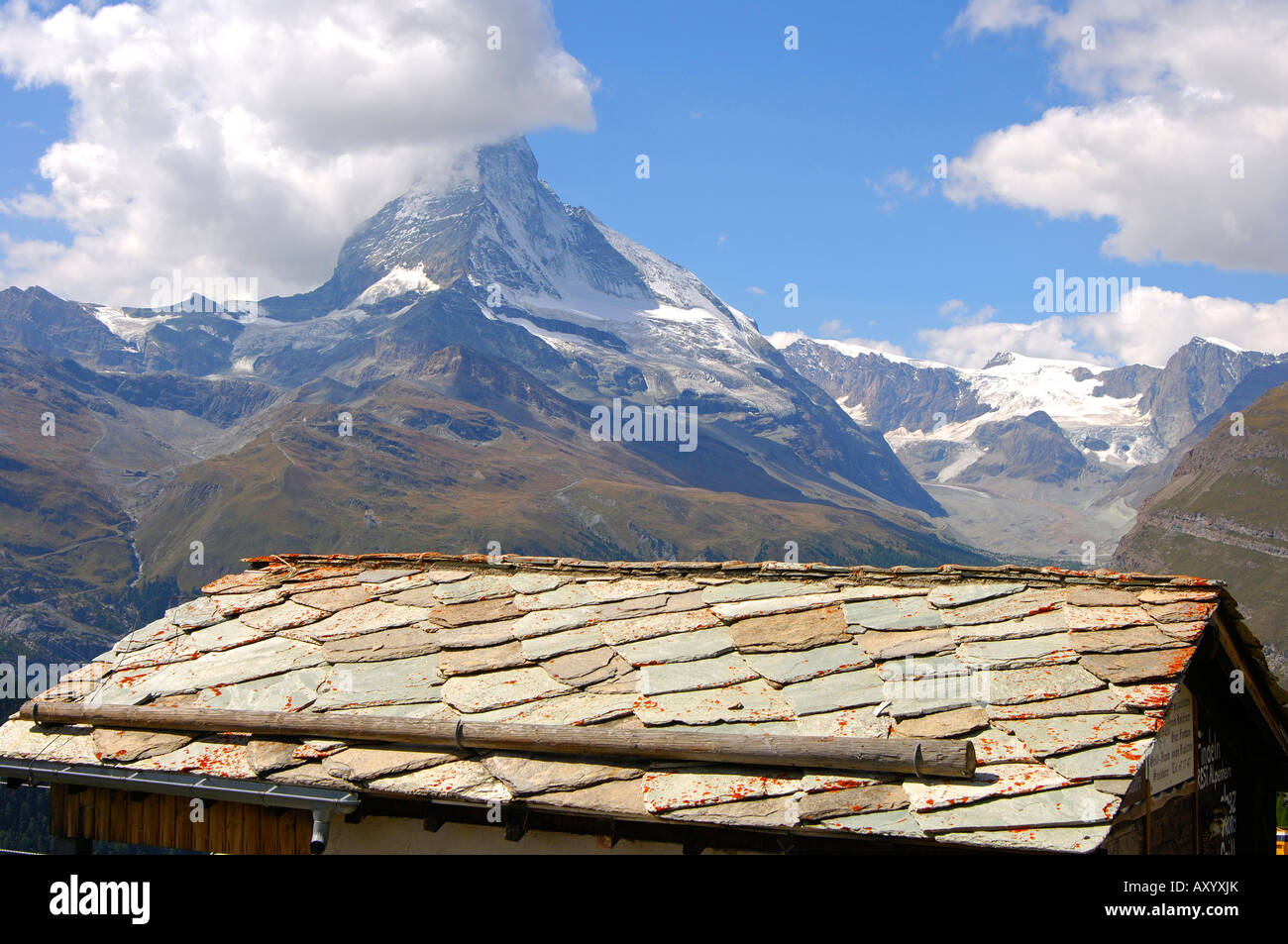 View across a slab roof to Mount Cervin Matterhorn partially hidden in ...