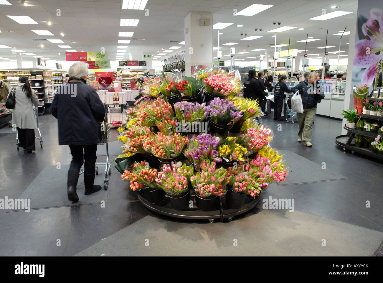 Flower displays in supermarket Stock Photo - Alamy