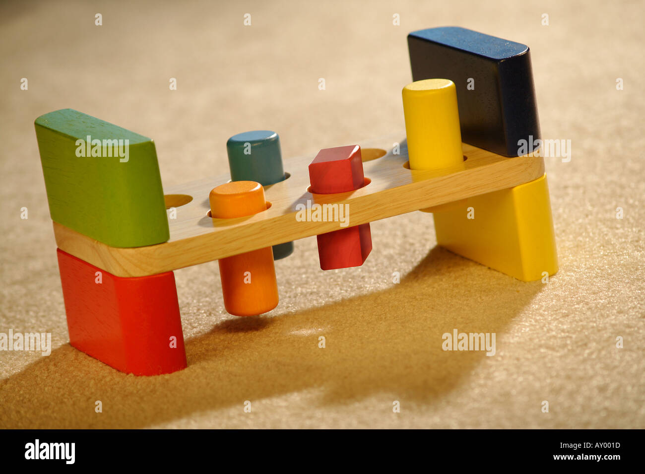 Square peg in a round hole Stock Photo - Alamy