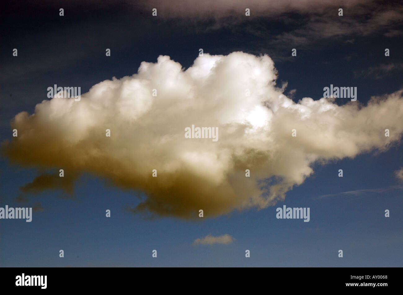 Shot of a stormy looking white cloud Stock Photo - Alamy