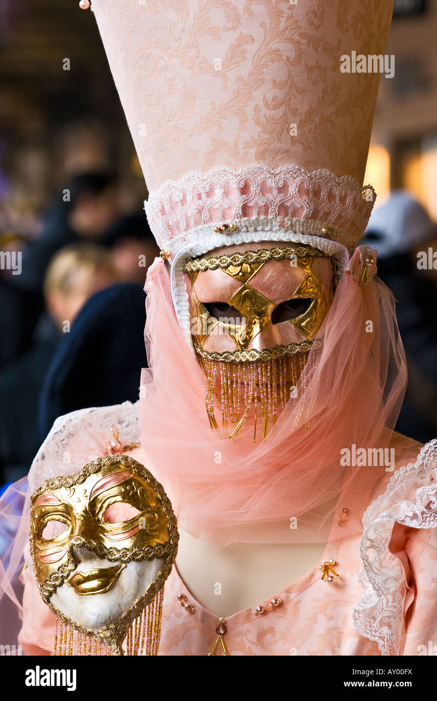 Pink mask in Venice Italy Stock Photo - Alamy