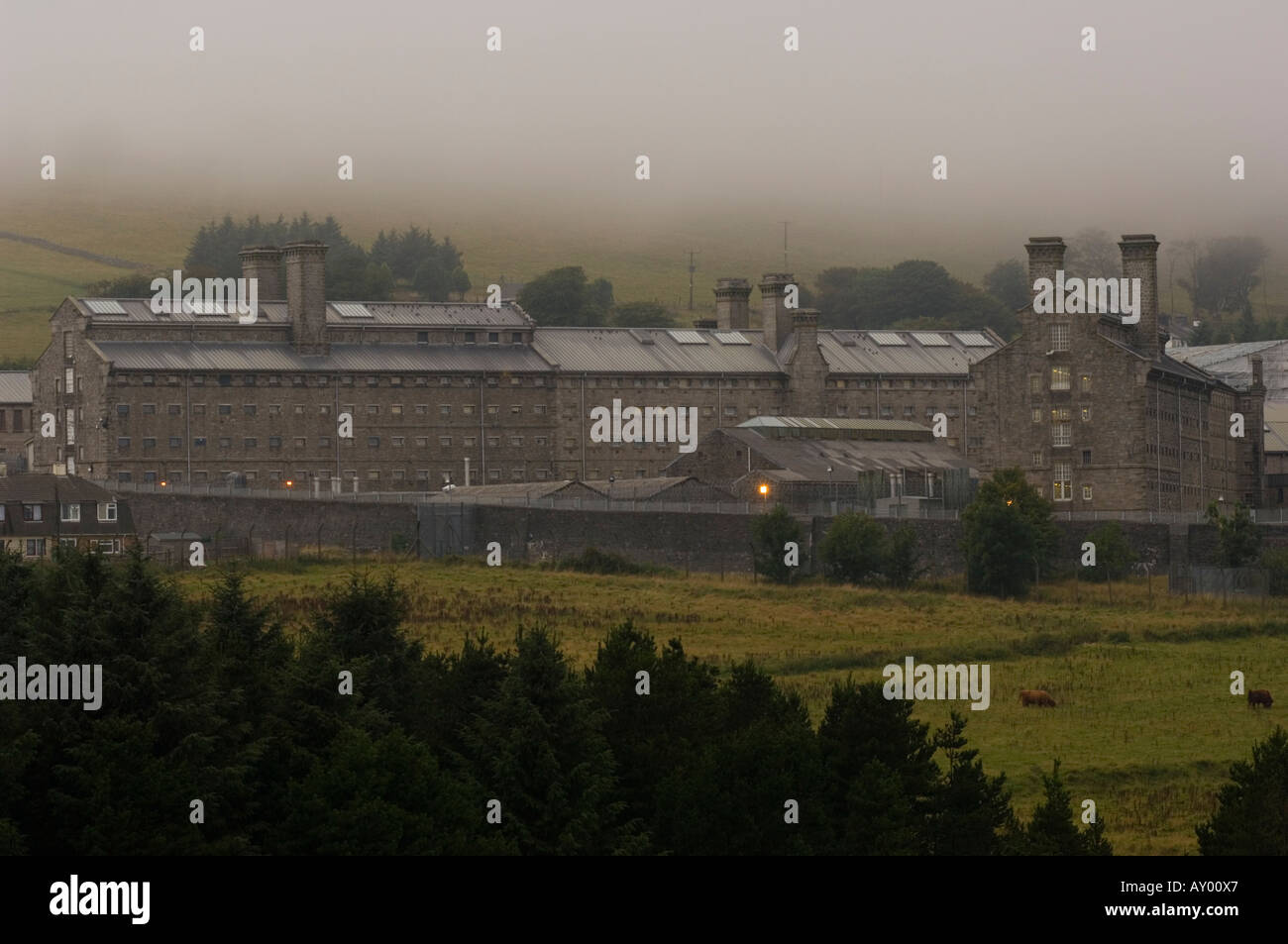The prison at Princetown on a moody and misty evening Dartmoor Devon ...