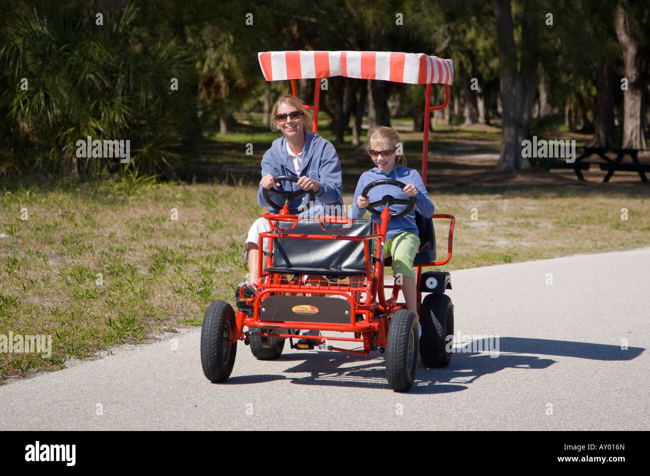 Mother and daughter in a buggy Stock Photo - Alamy