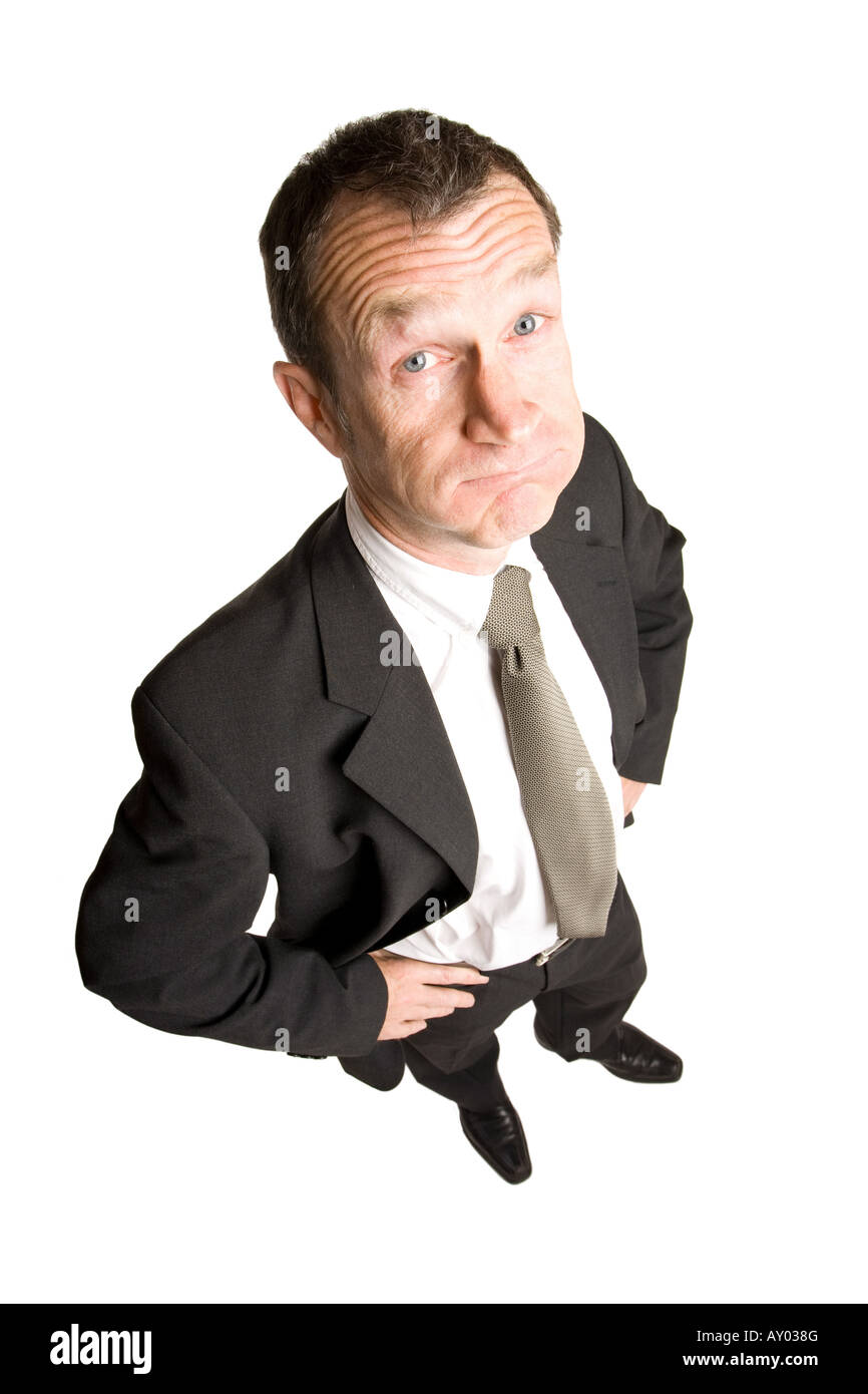 A Business man wearing a suit and a tie with boring expression. He has ...