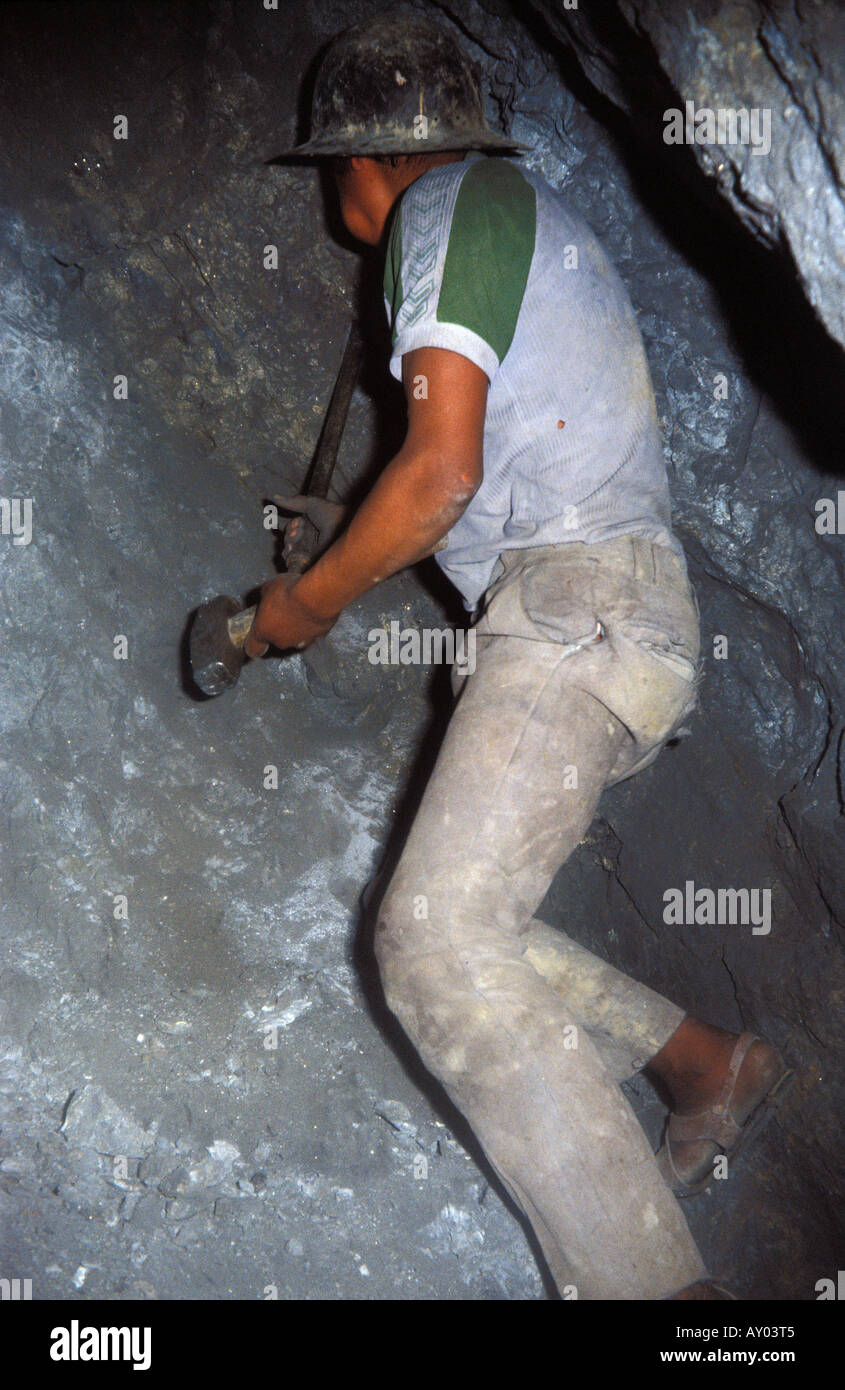 A miner at work in the silver mines of Potosi Stock Photo - Alamy
