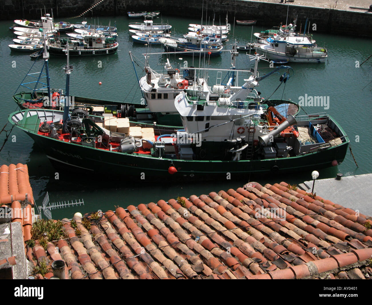 Spanish trawlers and fishing boats in harbour at San Sebastian Spain ...