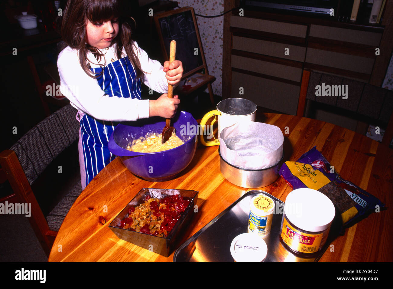 Child Mixing Christmas Cake Stock Photo - Alamy