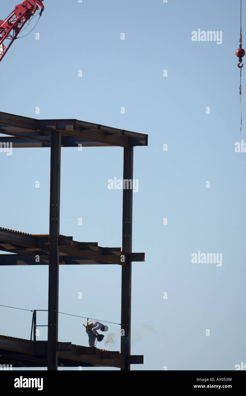 Iron worker on a new building Stock Photo - Alamy