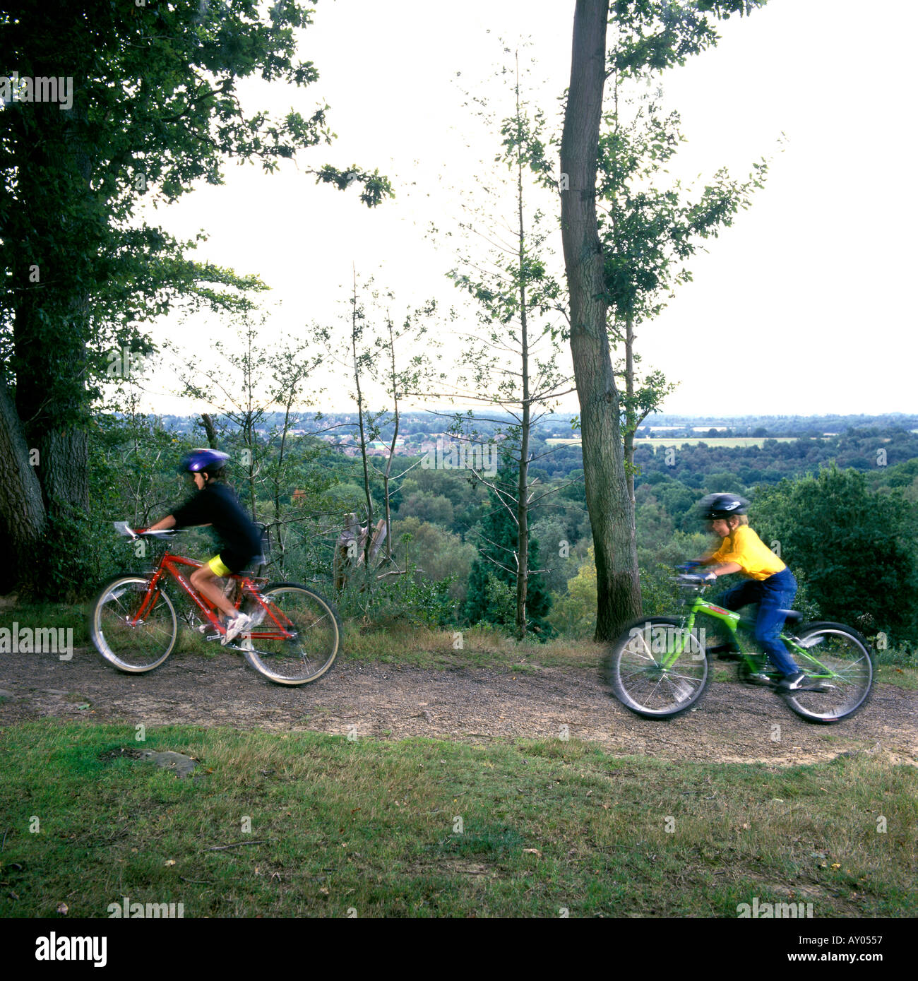 Two children enjoy fun bike hi-res stock photography and images - Alamy