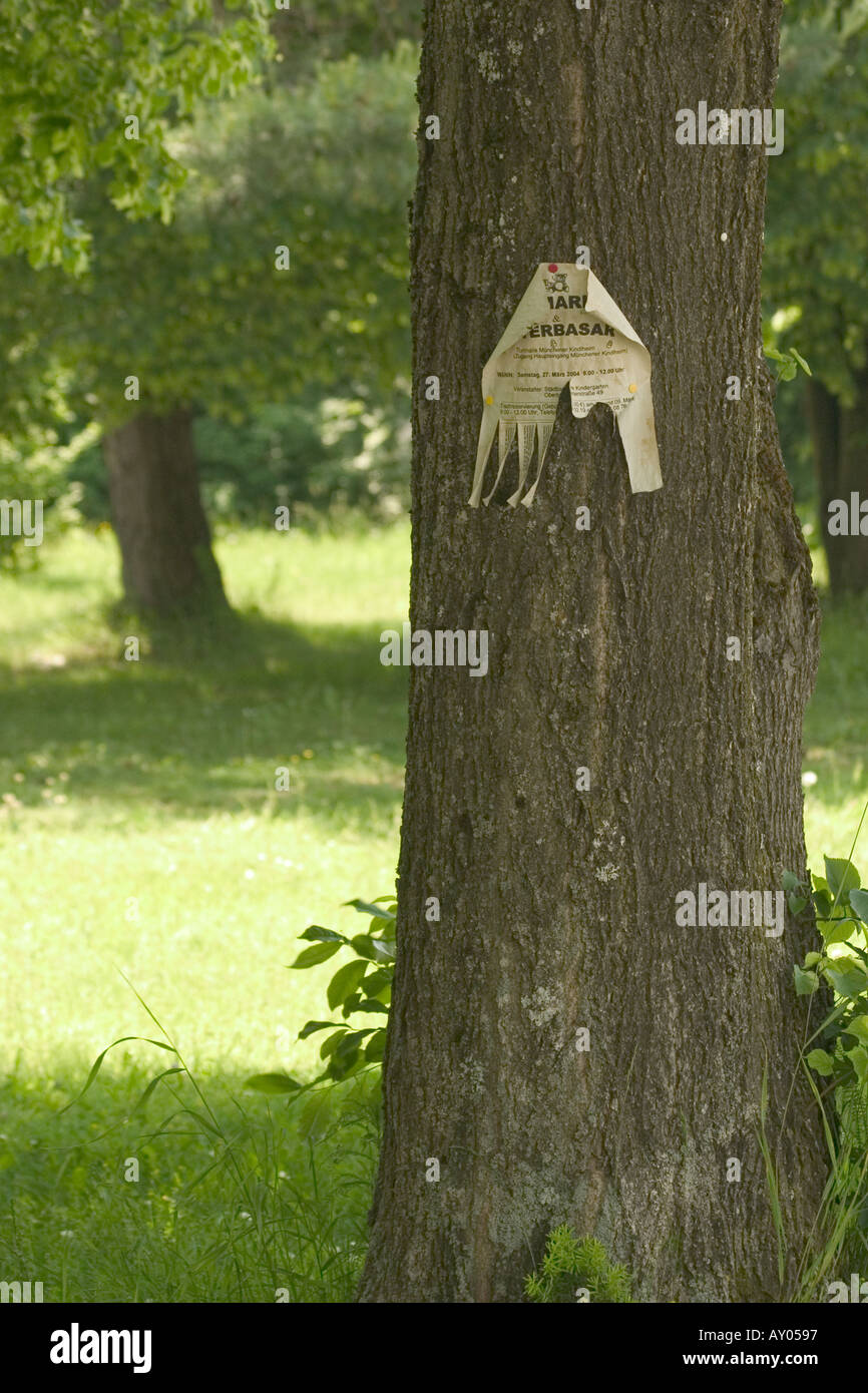 Advertisement on a tree hi-res stock photography and images - Alamy