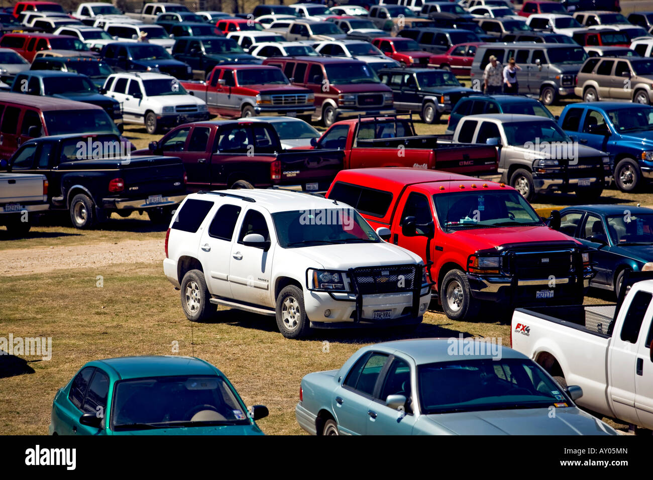 Texas parking lot trucks. Dirt field and almost all trucks Stock Photo ...