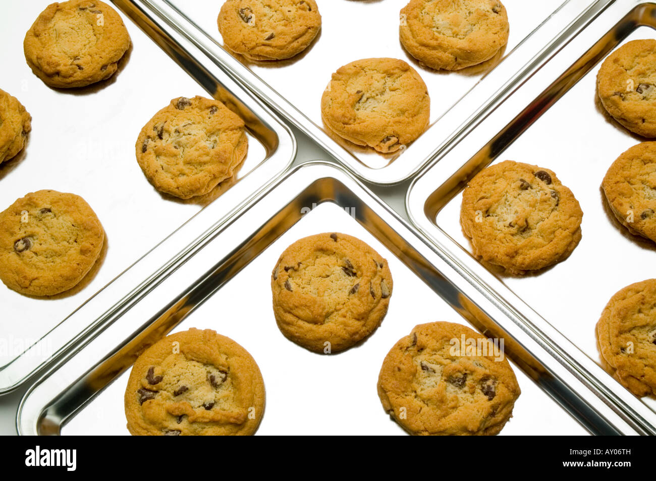 Chocolate chip cookies cooling on trays Stock Photo - Alamy