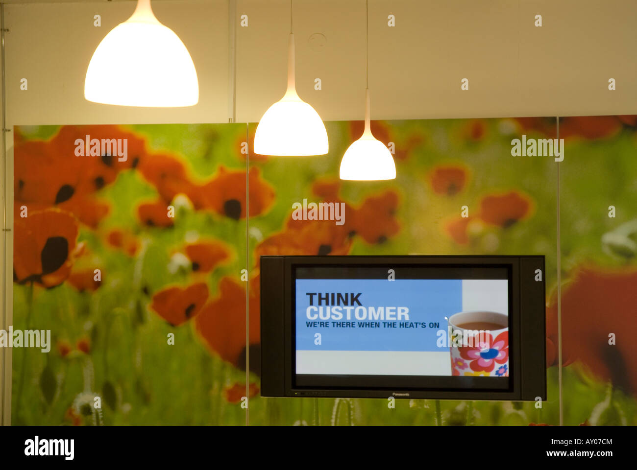 "Think Customer" message on reception TV Stock Photo - Alamy