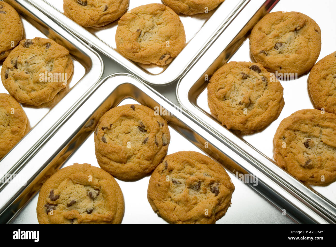 Chocolate chip cookies cooling on trays Stock Photo - Alamy