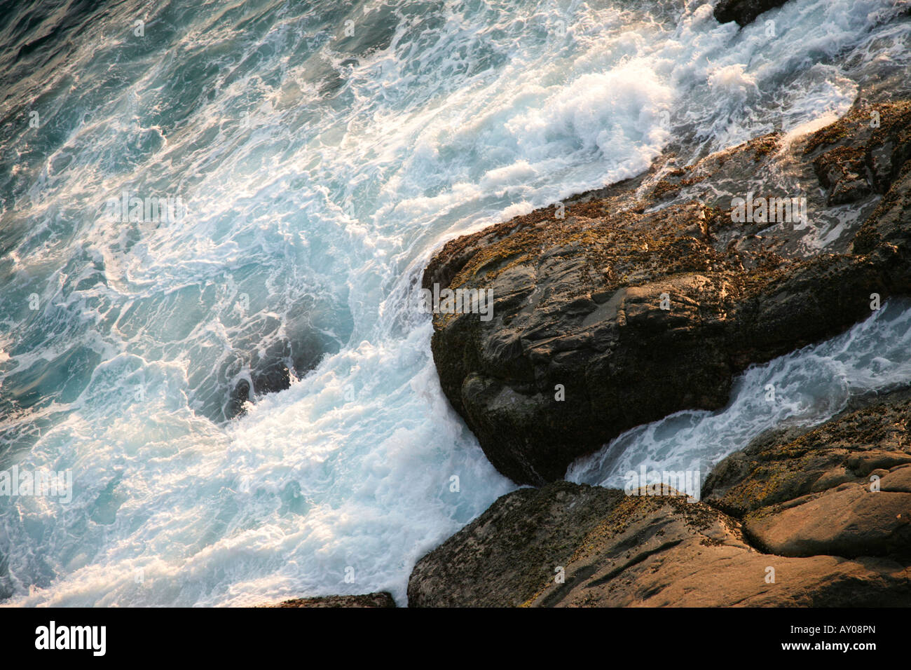 waves hitting rocks Stock Photo - Alamy