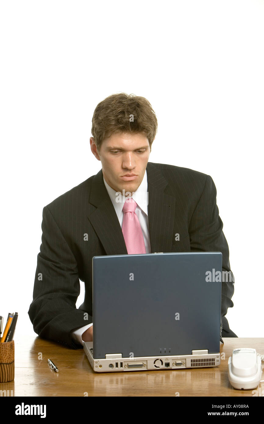 Man working at his desk Stock Photo - Alamy