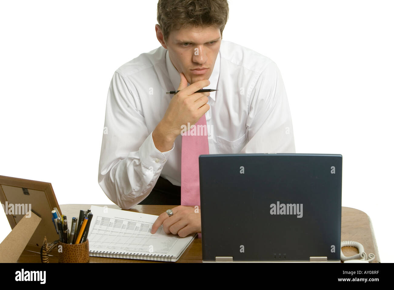 Business man at work at his desk Stock Photo - Alamy