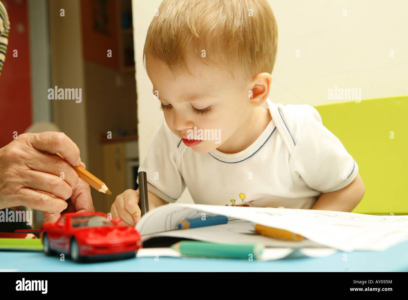 Talented boy draws Stock Photo - Alamy