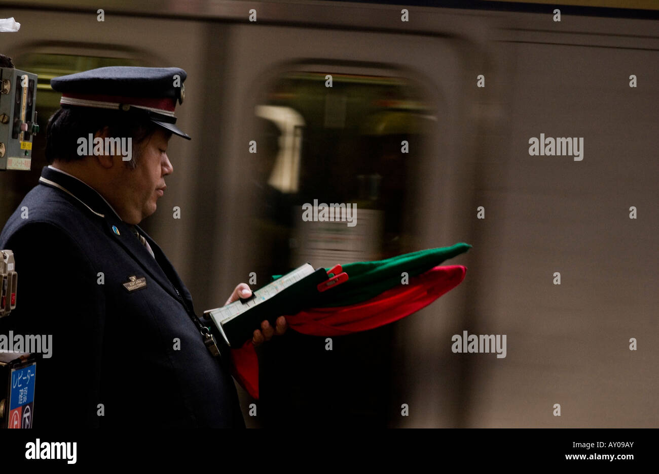 Train conductor, Tokyo, Japan Stock Photo - Alamy