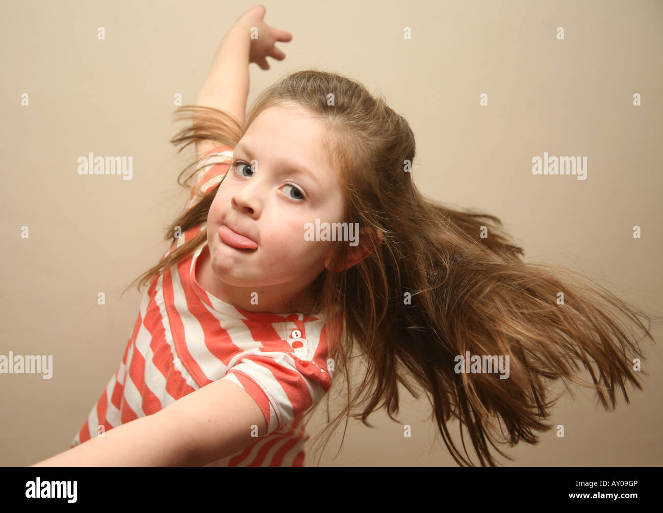 School girl sticking tongue out hi-res stock photography and images - Alamy