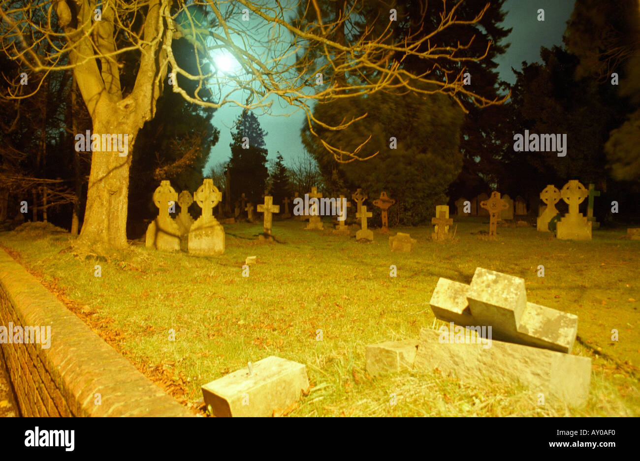 A night time scene of a graveyard Stock Photo - Alamy