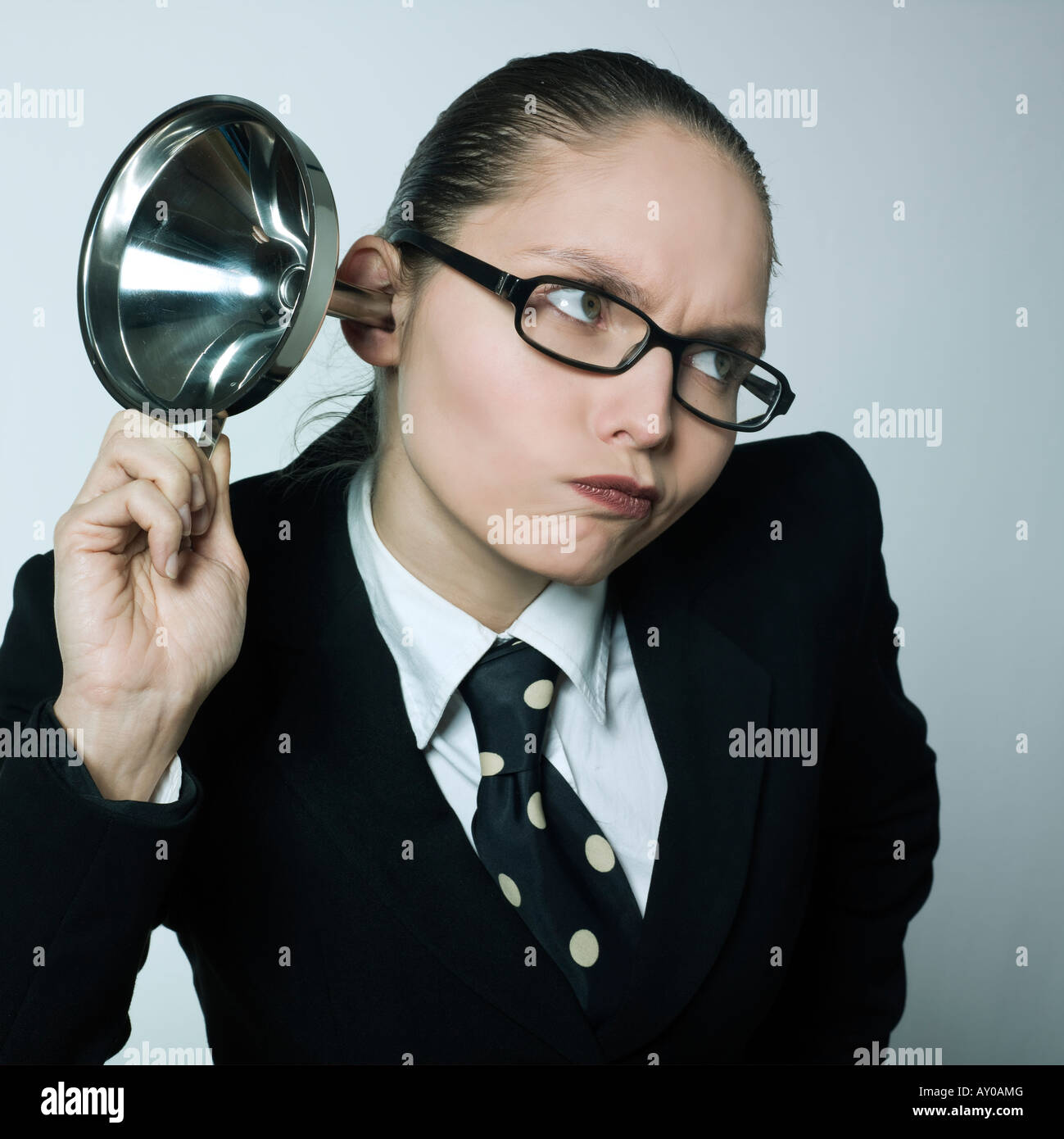 studio shot portrait of a beautiful curious business woman in a costume ...