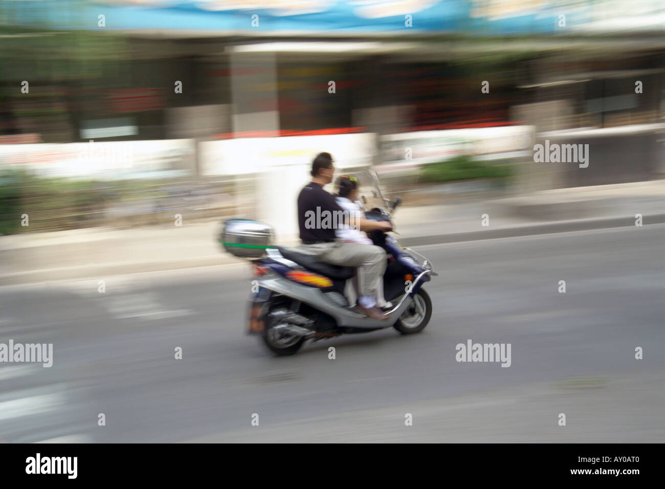 Speeding scooter hi-res stock photography and images - Alamy