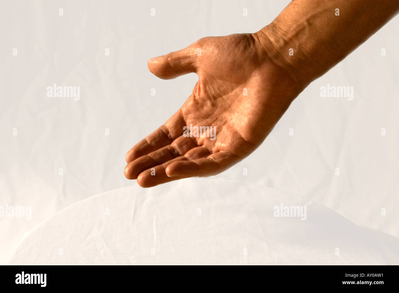 Open hand reaching to offer help Stock Photo - Alamy