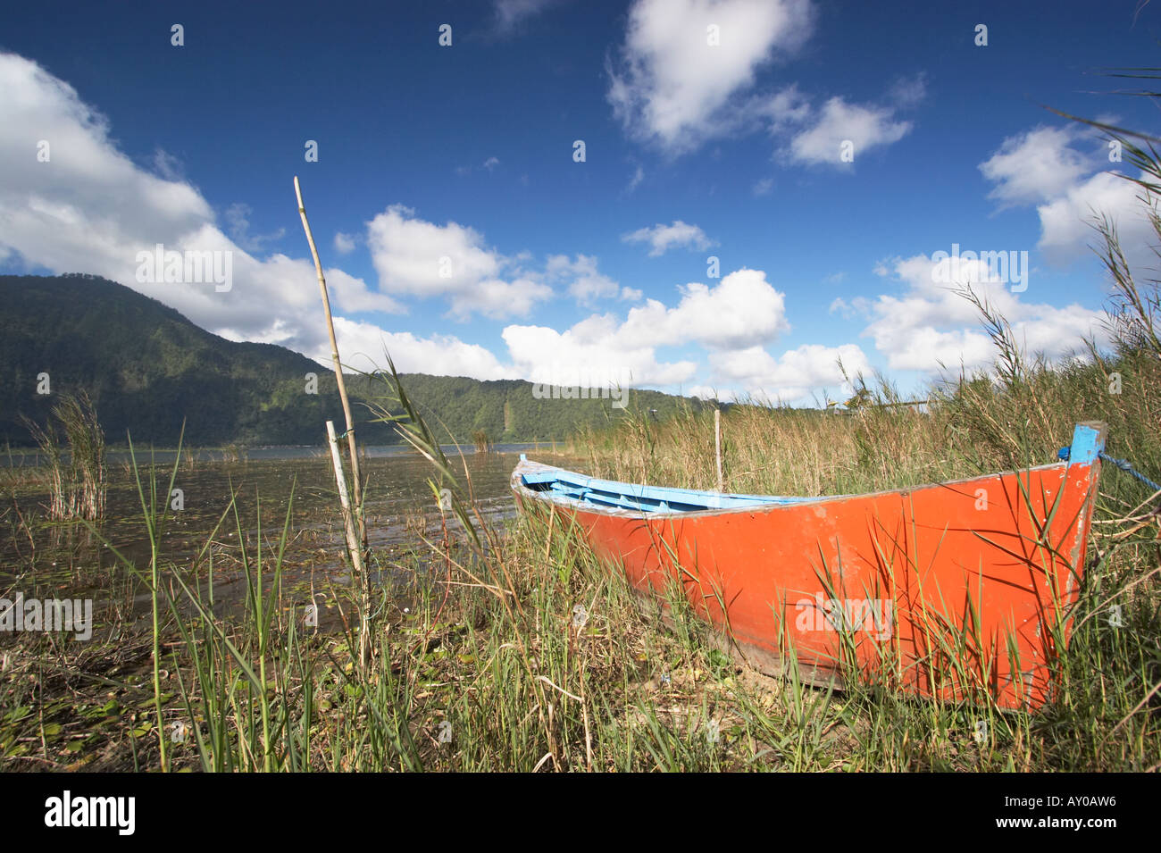 Red Rowing Boat At Danau Bratan Stock Photo - Alamy