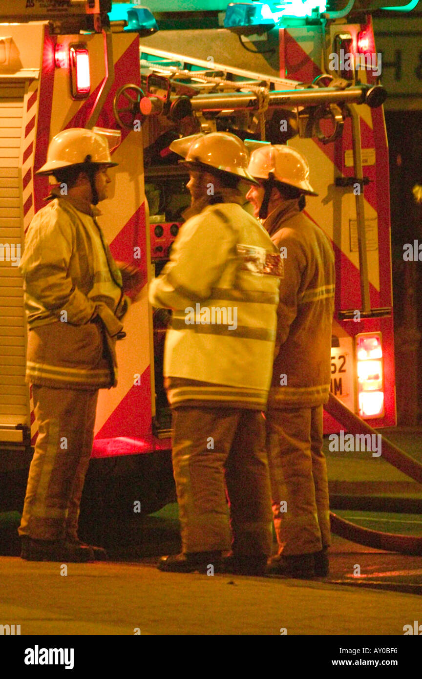 Firemen on duty at night Stock Photo - Alamy