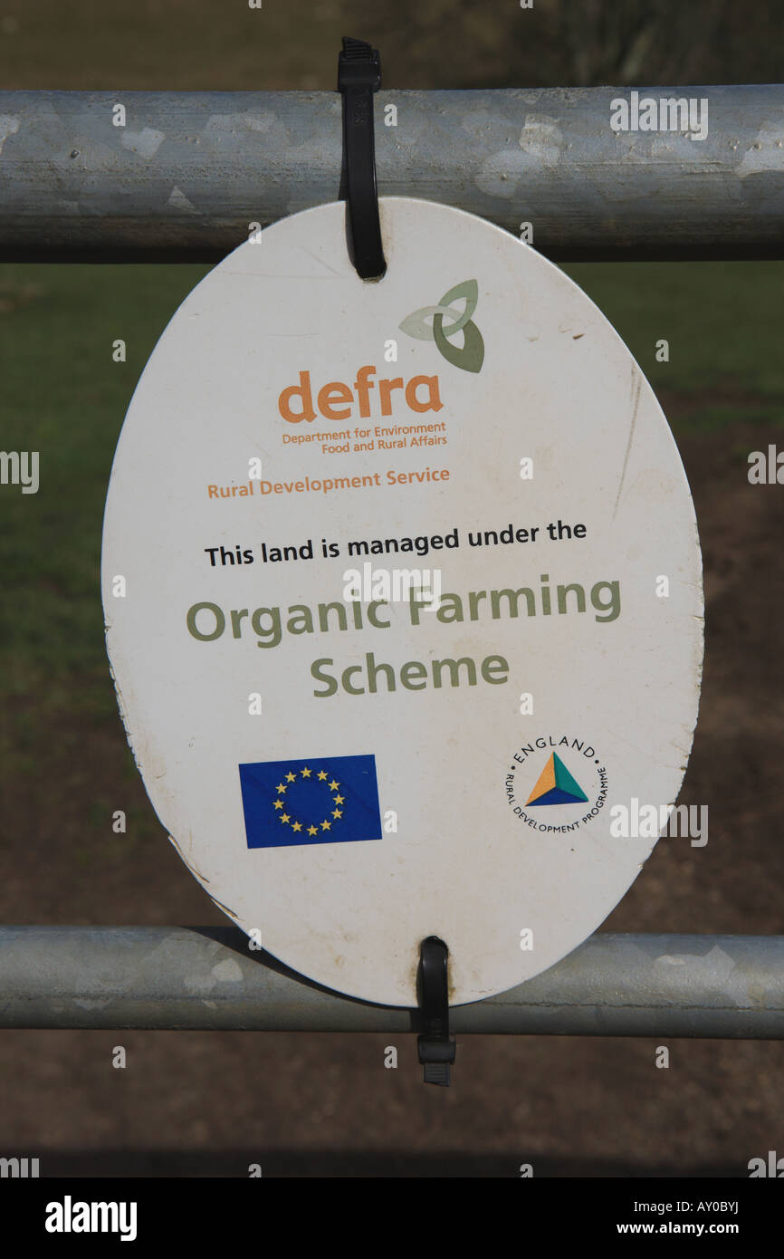 A sign for the Defra Organic Farming Scheme in the Cotswolds Stock ...