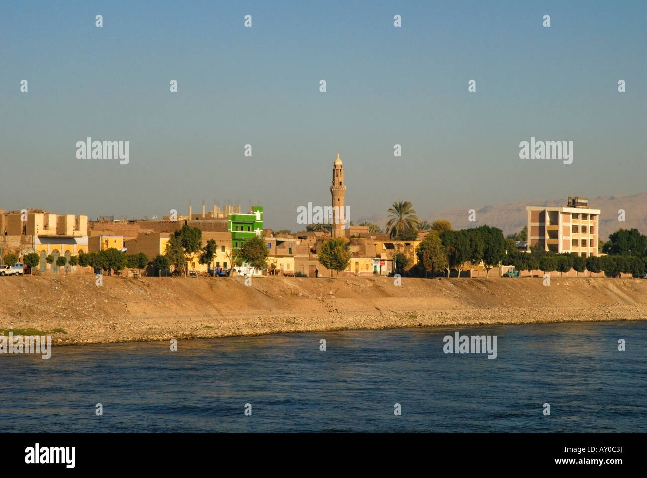 Cruising down the River Nile in Egypt with Town on Riverbank Stock ...