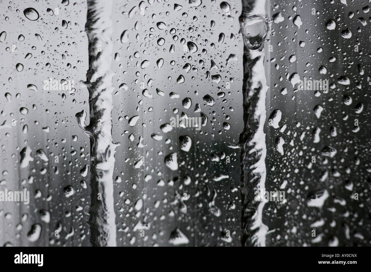 Rain on Laser light forming water bubbles Stock Photo - Alamy